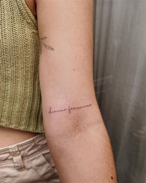 Divine Feminine Lettering Tattoo Hand Poked On The