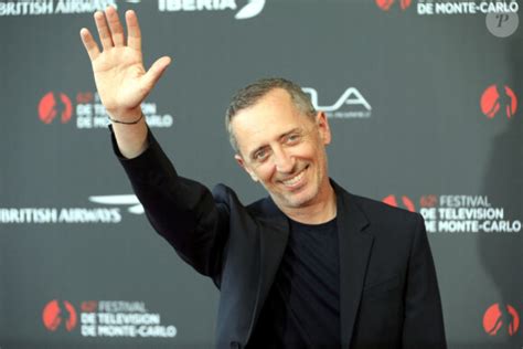 Photo Gad elmaleh sur le tapis rouge du photocall de la cérémonie d