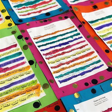 Colorful Papers With Music Notes On Them Are Lined Up And Placed Next
