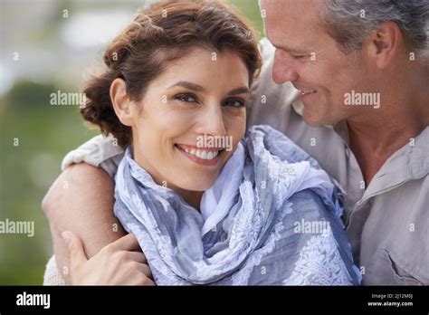 Appreciating One Another A Happy Mature Couple With Their Heads Together Affectionately Stock