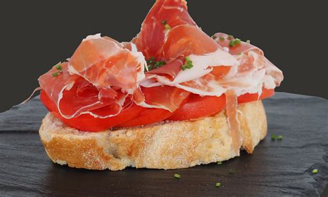 Tosta De Jam N Ib Rico Y Tomate Restaurante Malvarrosa