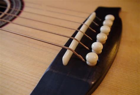 How To Find An Acoustic Guitar Saddle Replacement MacNichol Guitars