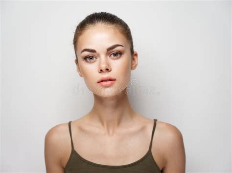 Portrait Of A Woman T Shirt On A Light Background Hairstyle Model Naked