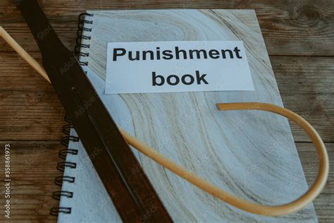 Punishment Book Leather Tawse And Cane For Spanking On Headmaster S Or