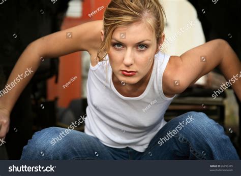 Sexy Woman Wearing Blue Jeans And A White Tank Top Stock 58016 Hot