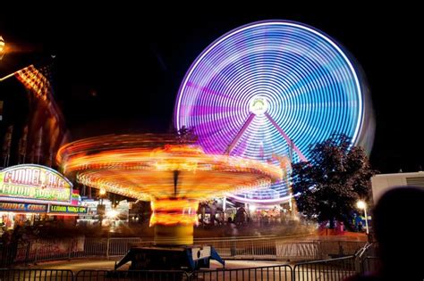 Premium Photo Illuminated Ferris Wheel Against Clear Sky At Night