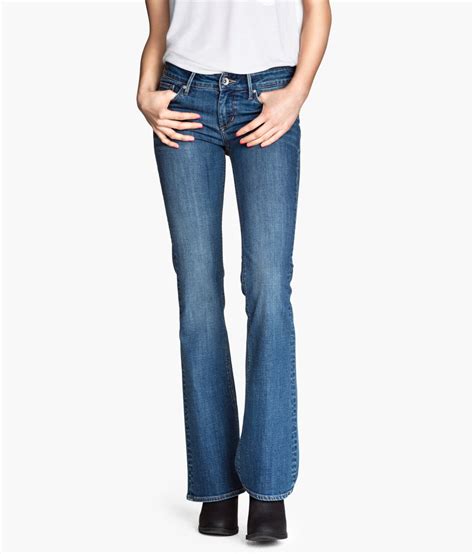 Lyst H M Bootcut Low Jeans In Blue