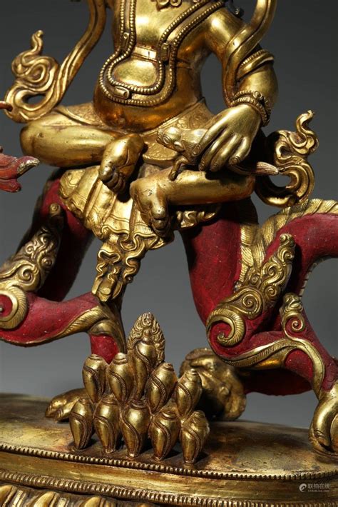 Bidlive A Gilt Bronze Figure Of Jambhala