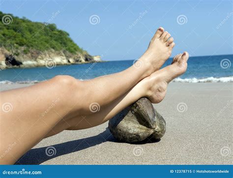 Female Legs Resting On Coconut Tropical Beach Stock Image Image Of