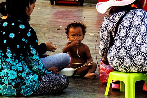 Naked Boy Sitting On Ground Eating Noodles Phnom Penh Flickr