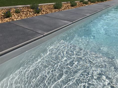 Piscine 10 x 4 Terrasse grés cérame Volet roulant immergé Lyneo