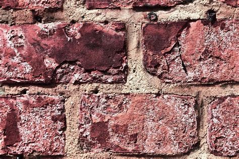 Detailed View At A Colorful Old And Weathered Brick Wall Texture As A