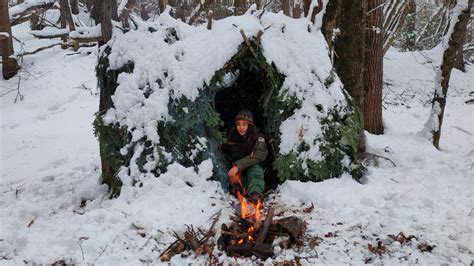 WINTER CAMPING In A SNOW STORM ALONE Survival Shelter Build Cold