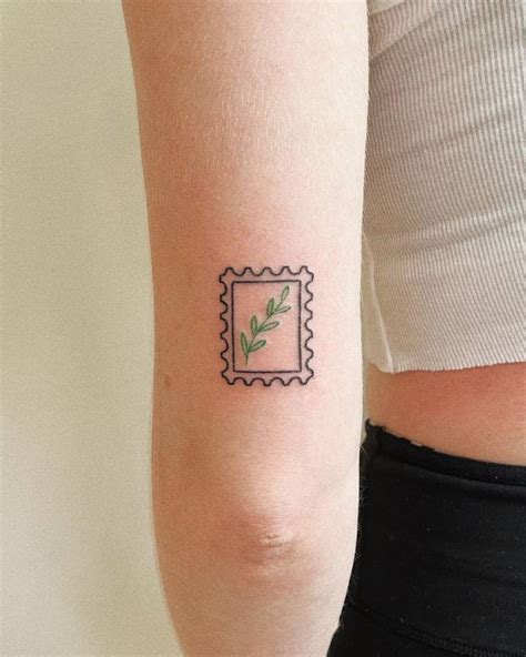 Sprig Stamp Tattoo Hand Poked On The Tricep