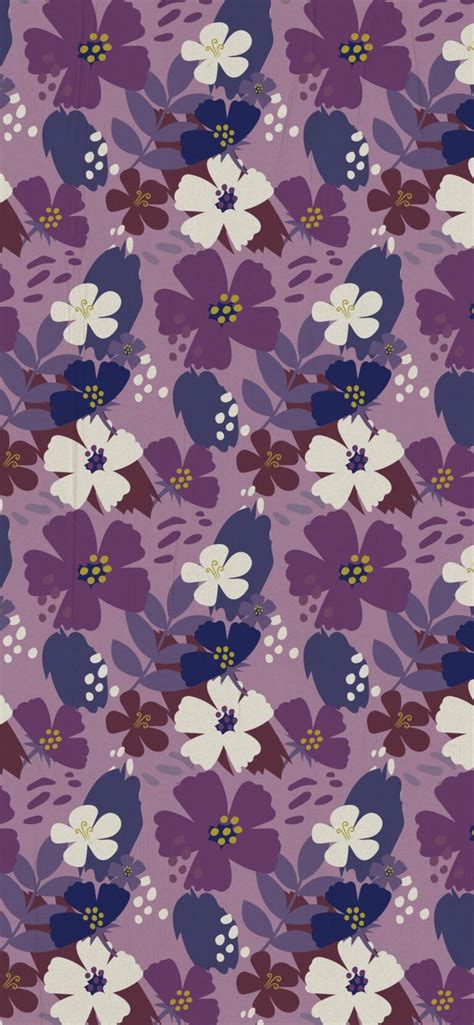 A Purple And White Flower Pattern On Fabric