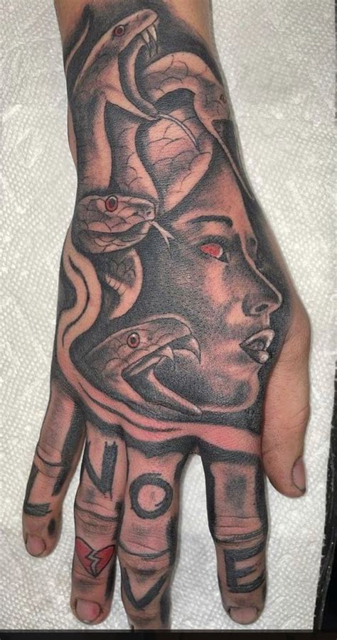 Pin On Tattoos Ideas Hand Tattoos For Guys Cool Tattoos For Guys