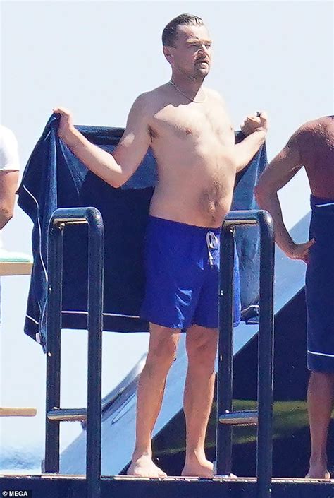 Leonardo DiCaprio Shows Off His Shirtless Physique In Navy Swimming
