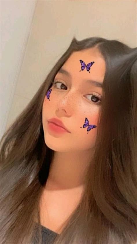 Pretty Asian Girl With Butterfly Face Paint