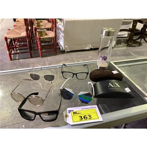Assorted Sunglasses Empty Designer Glasses Cases And Glass Water Bottle