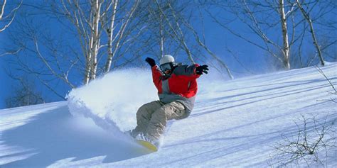 A Snowboarder At Myoko Ski Resort In Japan With Images