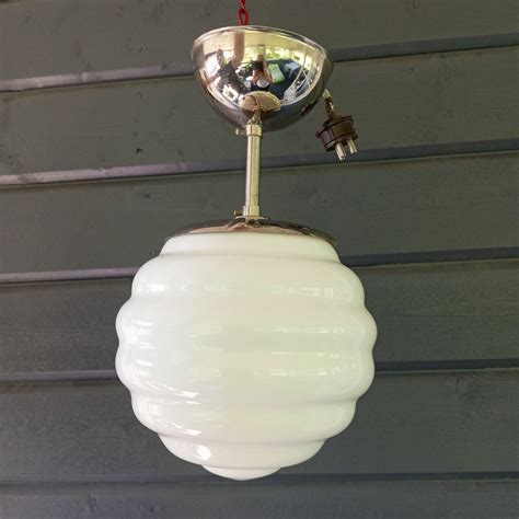 Se produkter som liknar Funkis BIKUPA LAMPA Art Deco på Tradera