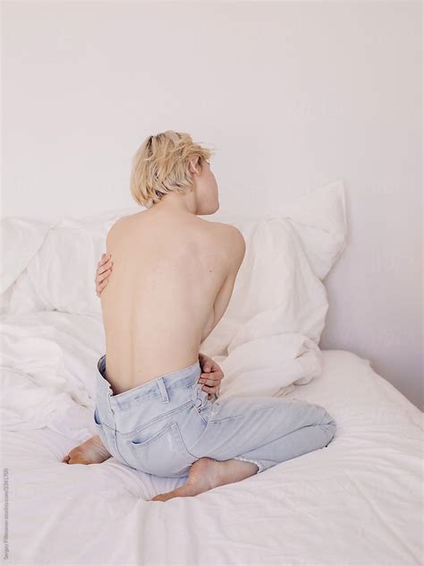 Anonymous Woman Sit On Bed By Stocksy Contributor Serge Filimonov
