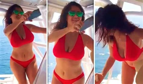Salma Hayek Flaunts Age Defying Assets In Red Hot Bikini As She Dances