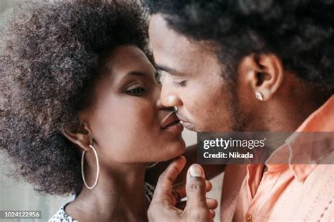 Black Couple In Love Kissing Photos And Premium High Res Pictures Getty Images