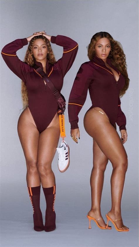 Two Women In Bodysuits Standing Next To Each Other