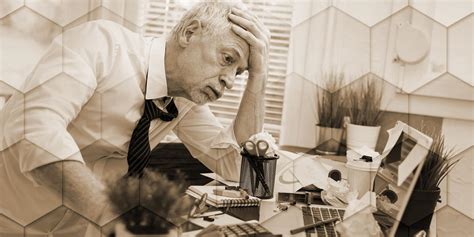 Overworked Businessman Sitting At A Messy Desk Geometric Pattern Stock