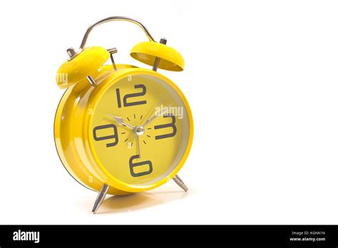Yellow Alarm Clock Isolated On White Stock Photo Alamy