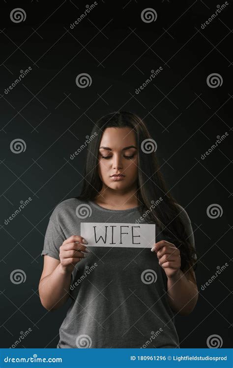 Front View Of Pretty Plus Size Girl Covering Eyes And Holding Card With