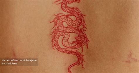 Fine Line Red Dragon Tattoo Located On The Upper Back