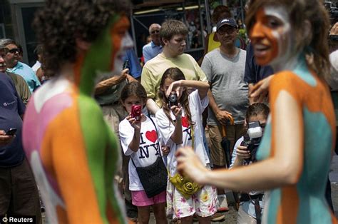 Bosoms And Bottoms Eclipse Bright Lights Of Times Square As Painter