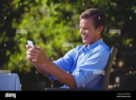Handsome Businessman Texting Stock Photo Alamy
