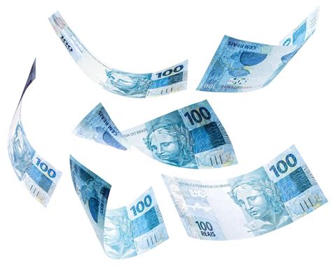 Billete De Cien Reales De Brasil Cayendo Sobre Fondo Blanco Aislado