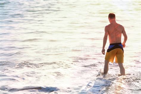 Man Standing In The Water At The Beach Stock Image Image Of Relax