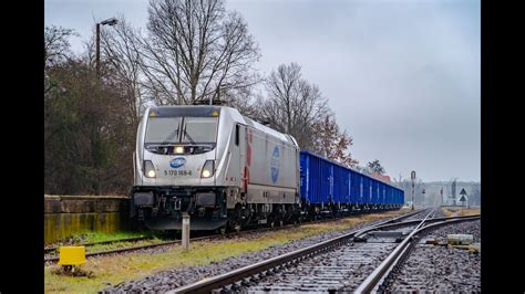 Orion Rail TRAXX DC3 594 018 z węglarkami i cysternami w trakcji