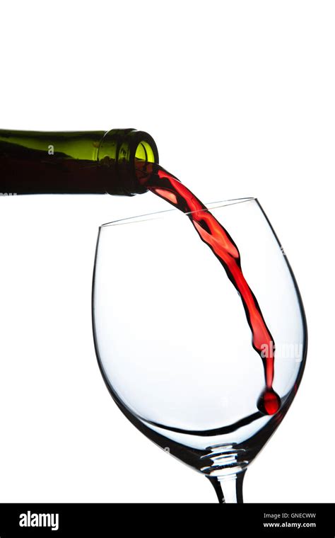 Red Wine Pouring Into Glass Isolated Stock Photo Alamy