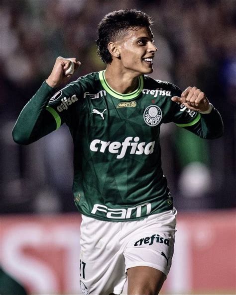 A Soccer Player Is Celebrating His Goal In The Game Against Sporting
