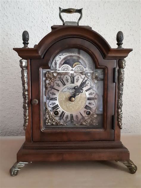 Pendule Warmink Bois Cuivre Verre Première moitié Catawiki