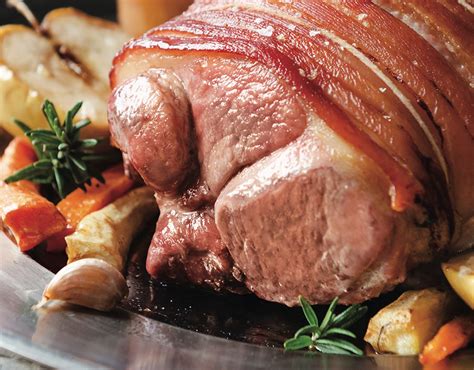 Rôti de porc au bacon et aux légumes dhiver