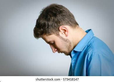 Person With Their Head Down