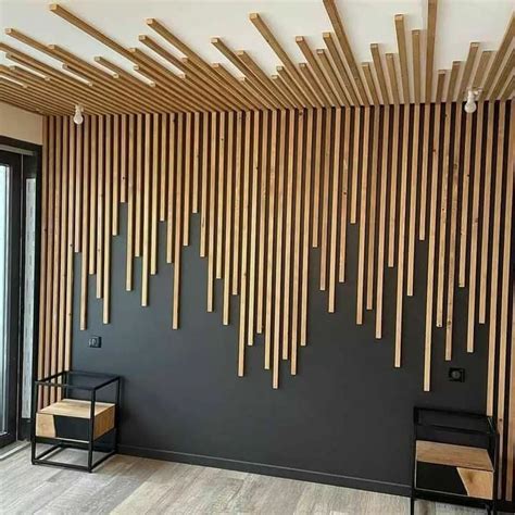 A Room With Black Walls And Wooden Slats On The Wall