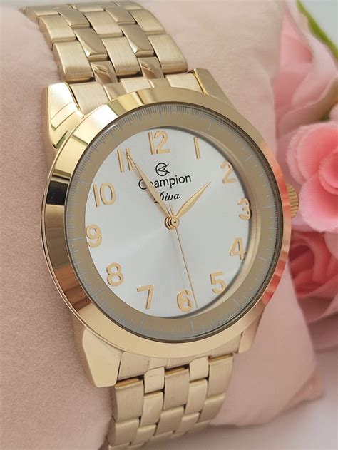Relogio Champion Feminino Dourado CN29749H Rafalu