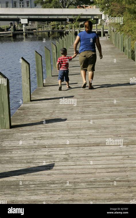 Mother And Son Walking Stock Photo Alamy