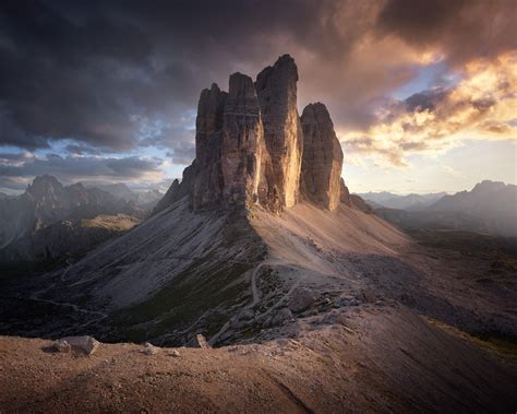 The Guardians Of Light The Tre Cime Di Lavaredo At Sunset Sexten