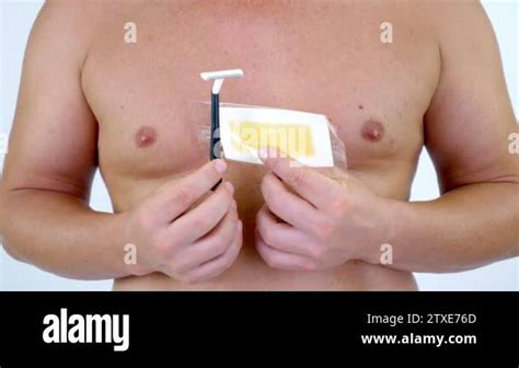 Close Up Mens Hands Hold Stripes With Wax And A Razor Different Means