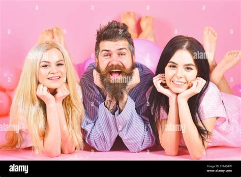 Cheerful Morning Concept Threesome Relaxing In Morning Man And Women Friends On Smiling Faces