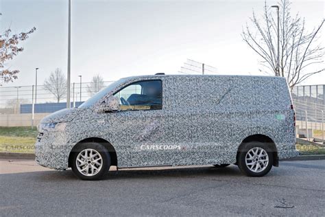 Vw Transporter T Spied In Ev Form With A Double Cab Flatbed Body